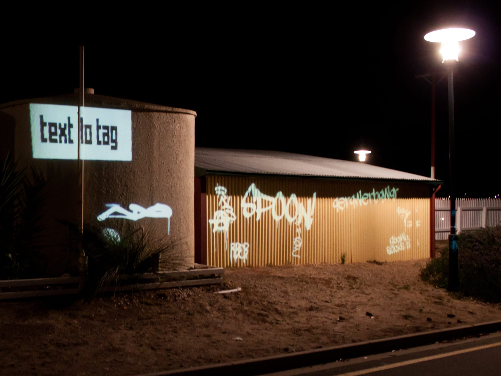 An Interactive Projection-Mapped Graffiti Wall